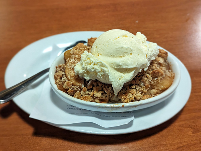 Apple cobbler topped with ice cream, because sometimes dessert needs a warm hug and a cold friend.