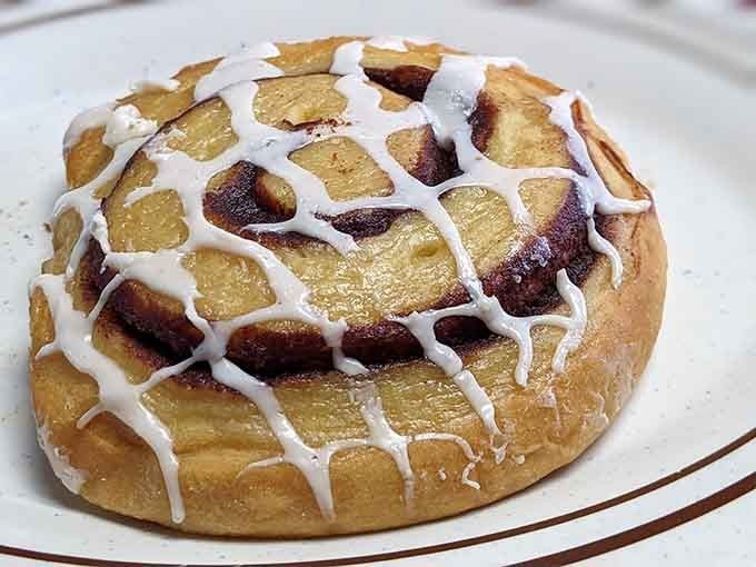 This cinnamon roll drizzled with icing could double as dessert or the world's best breakfast indulgence.