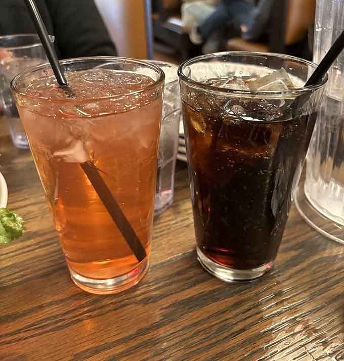 Cold drinks in simple glasses, because when the pizza's this good, beverages just need to stay refreshing.