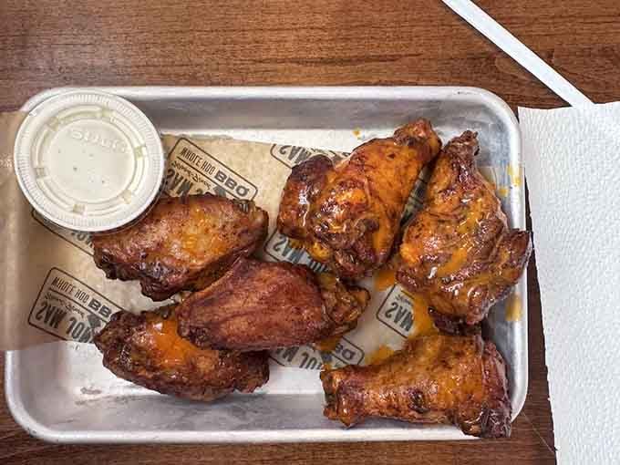 Six beautifully bronzed smoked wings that prove chicken can hold its own alongside the legendary whole-hog barbecue.