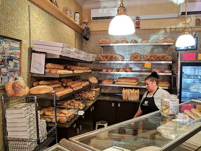 Behind that counter, bakers work their magic daily, turning flour and water into edible gold for grateful customers.