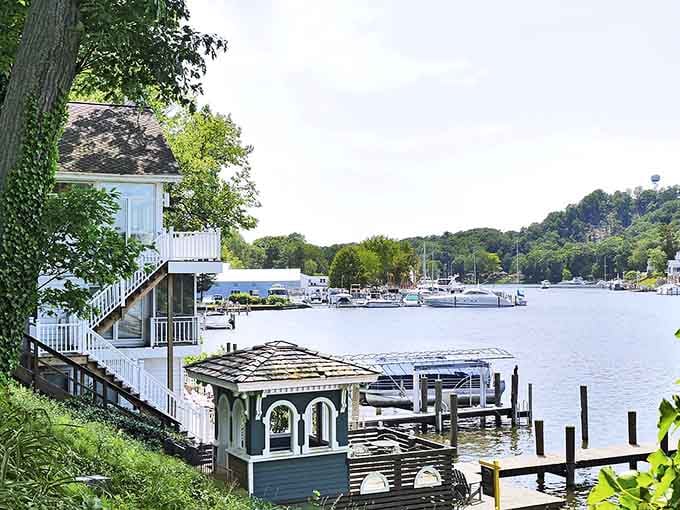 Charming boathouses line the water's edge, each one more picturesque than the last, like a watercolor come to life.