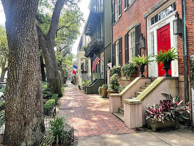 Brick sidewalks, colorful doors, and enough potted plants to make your local nursery jealous of this residential perfection.