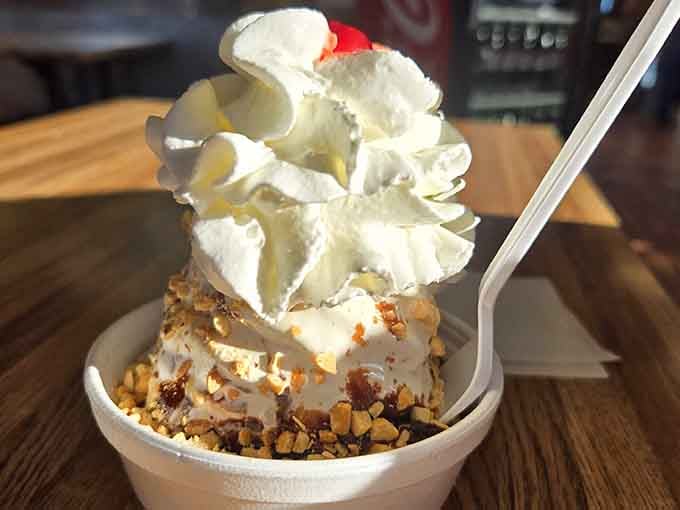 That sundae's whipped cream tower could give the Leaning Tower of Pisa a run for its money.