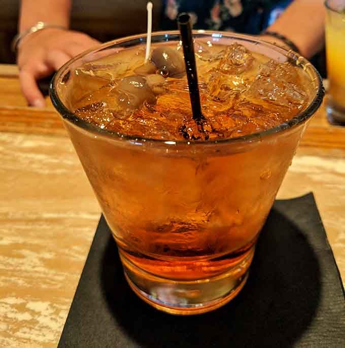 A proper Wisconsin Old Fashioned, amber and inviting, the liquid handshake that starts every great supper club experience.