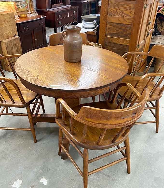 Solid oak dining tables where families gathered before smartphones existed, complete with chairs that actually support your back.