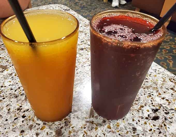 Two tall glasses of refreshment await, because navigating two hundred feet of buffet is thirsty work indeed.