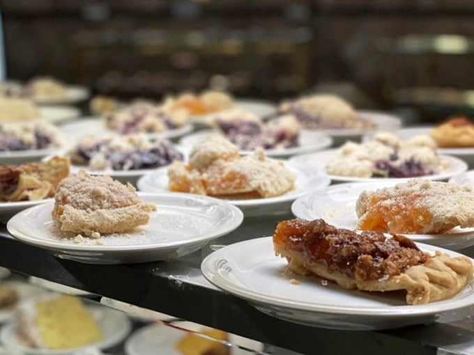 Pies lined up like edible soldiers, each one a different flavor of temptation waiting to ruin your diet.