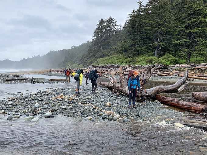 Even in rain gear, hikers can't help but pause to admire what four miles of effort delivers.