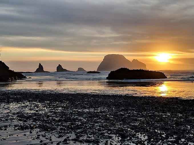 Three Arch Rocks frame a sunset so stunning, your camera will never quite capture what your eyes see.