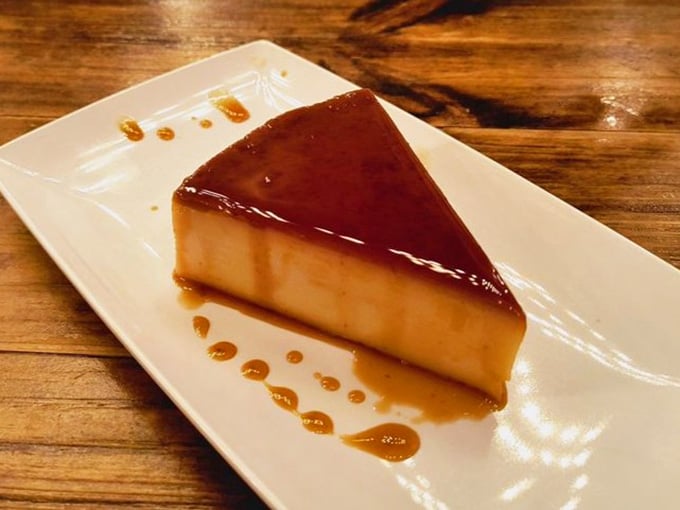 Smoked flan with caramel drizzle, proving that even dessert gets the smokehouse treatment here and we're not complaining.