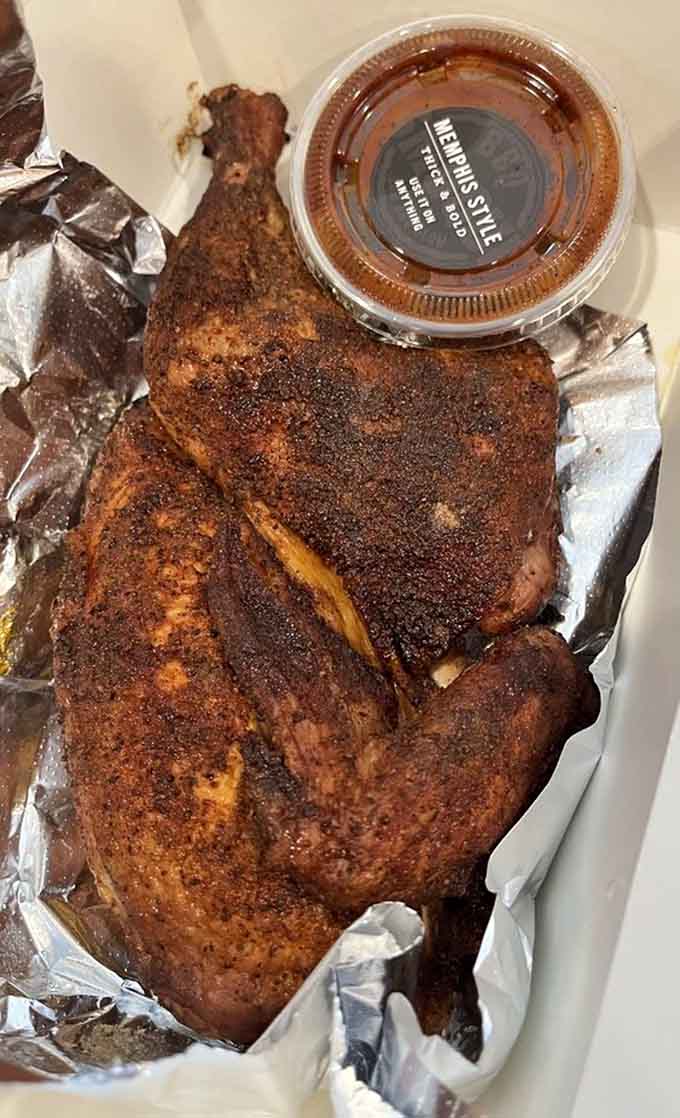 Crispy-skinned chicken proving poultry deserves respect in the barbecue world, not just relegated to boring backup status always.
