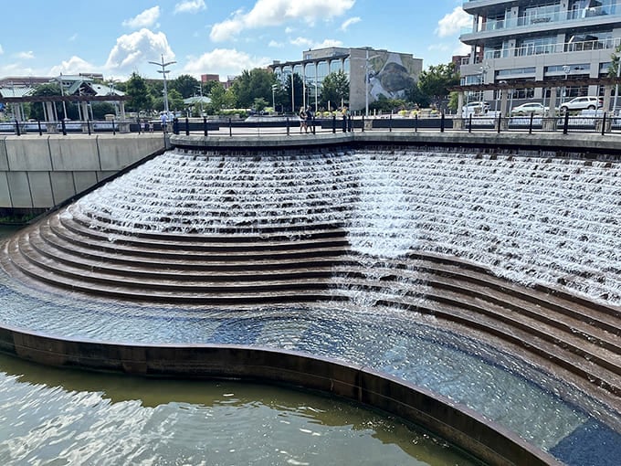 Water cascading down steps like nature's own amphitheater, minus the overpriced concert tickets and parking nightmares you'd expect.