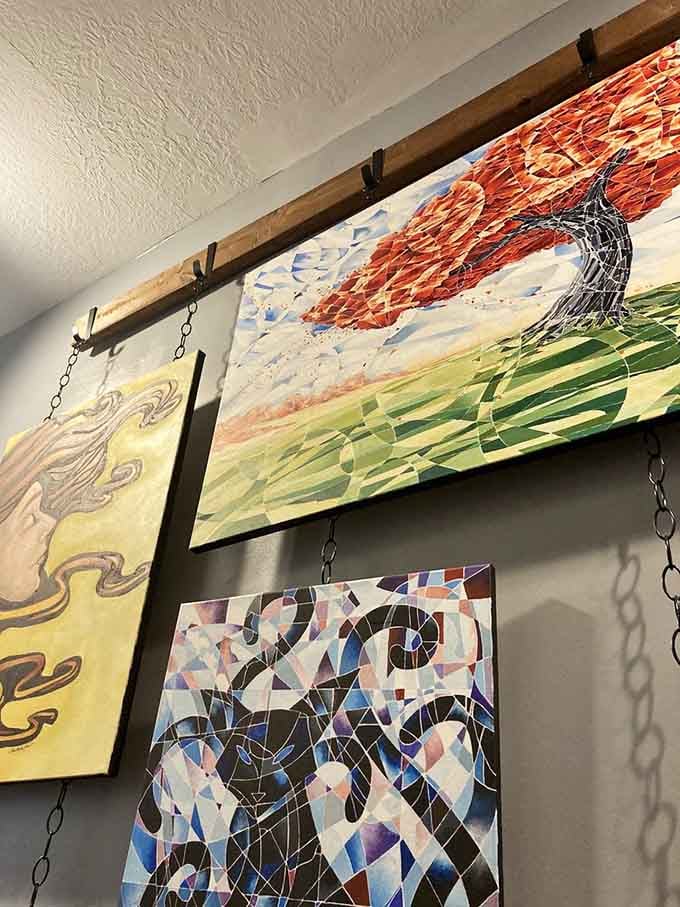 Local artwork adorns the walls, proving that healing spaces can be beautiful and support community artists simultaneously.