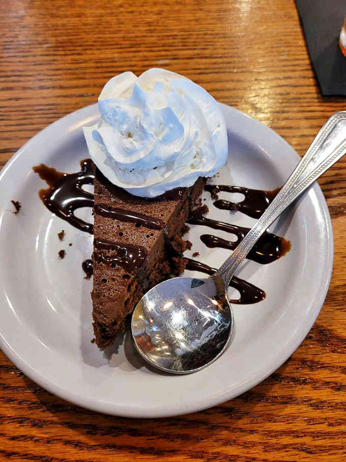 Chocolate dessert with whipped cream topping: because sometimes you need to end on an absolutely decadent note.