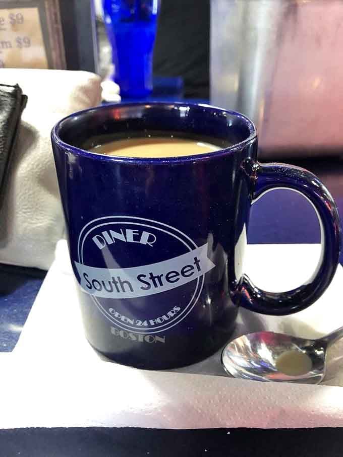 Coffee served in their signature mug, hot and ready to jumpstart your day or salvage your night, no questions asked.