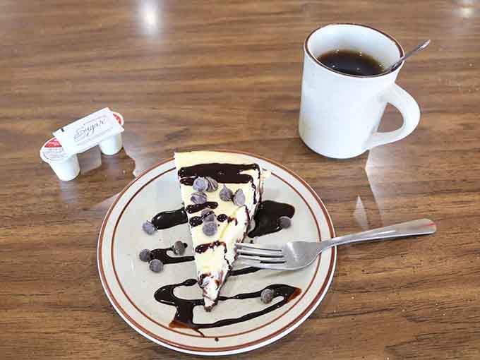 Chocolate chip cheesecake drizzled with chocolate sauce&mdash;because sometimes dessert at a diner is absolutely necessary.