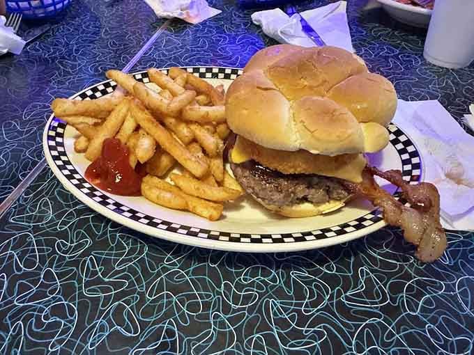 The Ohio burger on a pretzel bun represents state pride in its most delicious, handheld form possible.