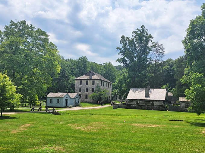 The three-story gristmill anchors the village like a limestone monument to simpler, grindier times.