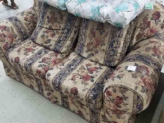 This floral sofa is giving serious grandma-chic vibes, and honestly, we're here for it.