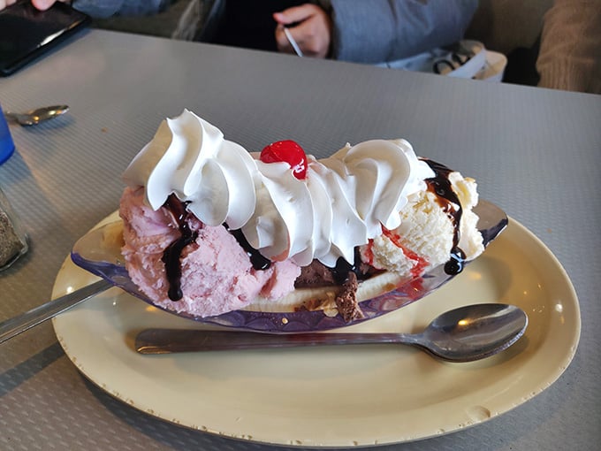 This banana split towers with whipped cream and cherry-topped ambition, defying both gravity and calorie counters everywhere.