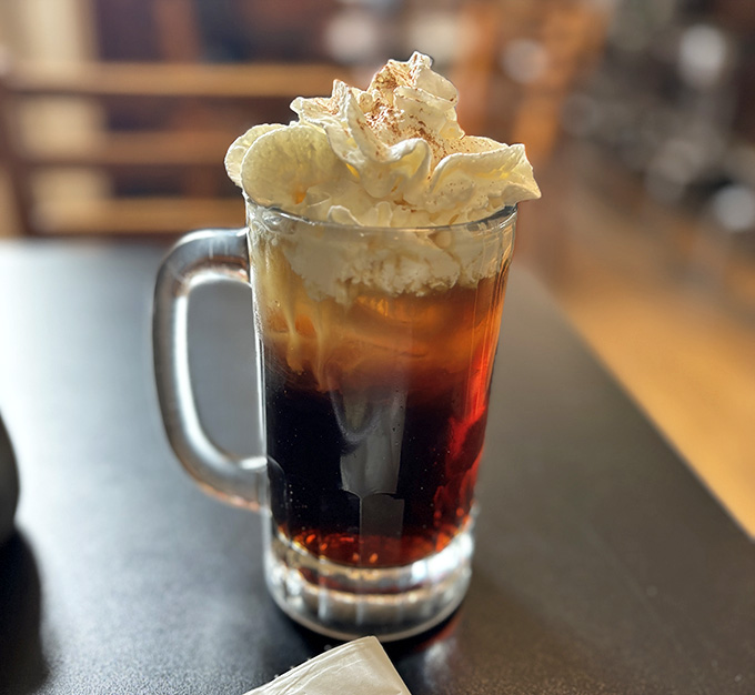Bourbon ball iced coffee topped with whipped cream proves Kentucky knows how to caffeinate with style and a little sweetness.