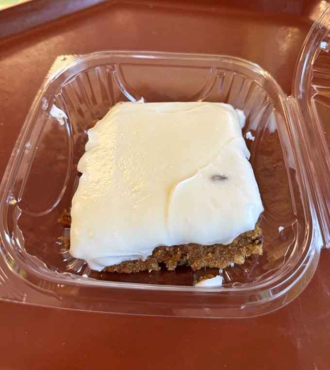 Carrot cake with cream cheese frosting so thick it deserves its own zip code, sweet salvation in every bite.