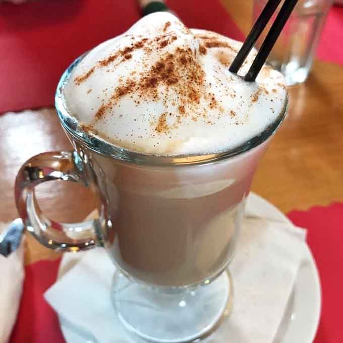 That whipped cream mountain on your coffee is basically dessert before dessert, and nobody's complaining about it at all.