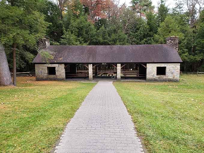 This stone pavilion offers shelter and picnic spots where lunch tastes better surrounded by forest.