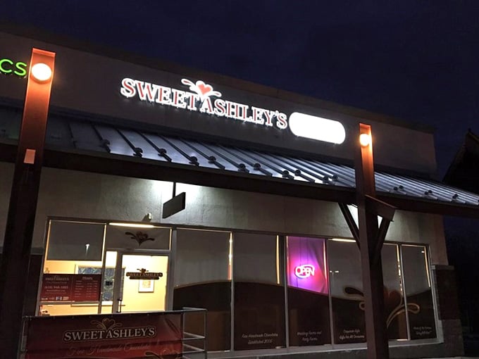 That glowing "OPEN" sign at dusk is like a beacon calling chocolate lovers home after a long day.