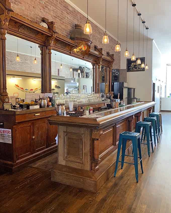 That gorgeous wooden bar with turquoise stools is where coffee dreams and pastry fantasies become reality.
