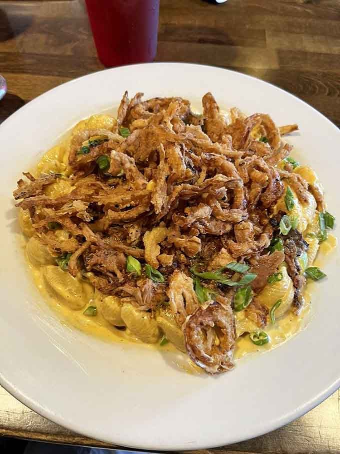 Mac and cheese topped with crispy onions is the kind of creative thinking that deserves a standing ovation.
