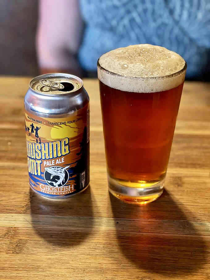 Local craft beer pairs perfectly with pizza that requires architectural planning before your first bite even happens here.