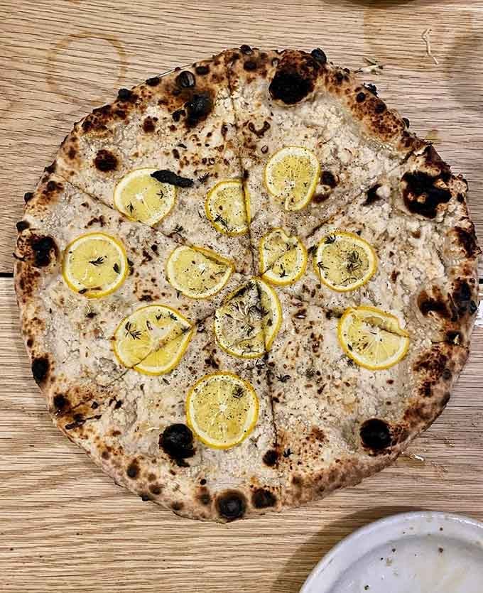 Meyer lemon slices on pizza might sound unusual, but one bite proves that sometimes the best ideas are the unexpected ones.