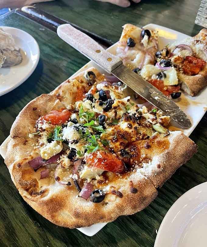 Mediterranean flatbread that brings coastal Italy to coastal Virginia in the most delicious way humanly possible.