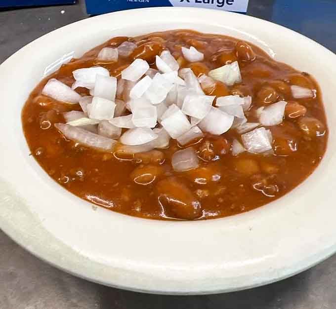 That chili topped with onions has been warming souls and starting conversations since your grandparents were dating.