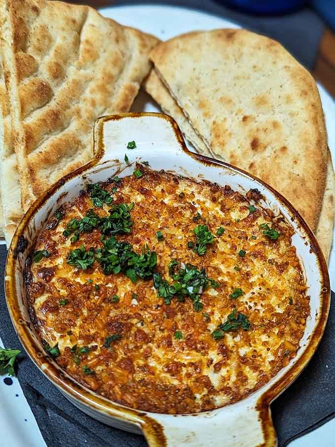 Hot crab dip with flatbread is the kind of starter that derails your dinner plans entirely.