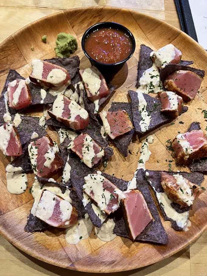 Seared tuna on tortilla chips with wasabi aioli proves that sometimes fusion food actually makes perfect sense on a dock.