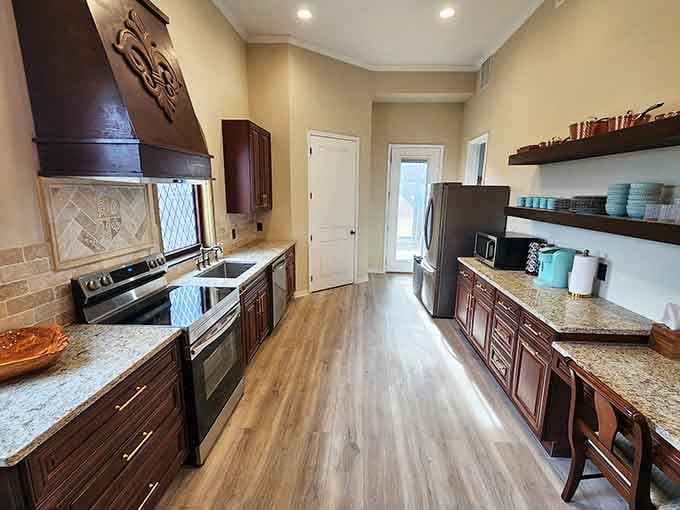 A kitchen where you can cook modern meals surrounded by Gothic windows, proving time travel is possible through architecture alone.