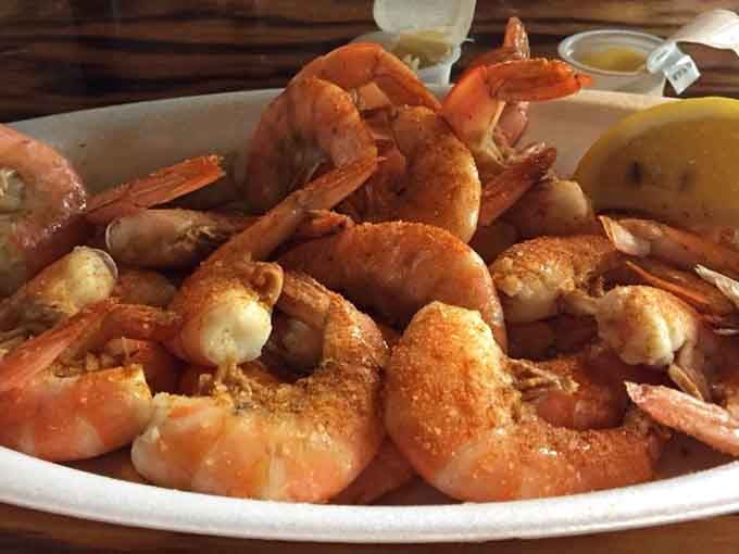 Boiled shrimp piled high enough to make you question whether you ordered enough, then realize you did.