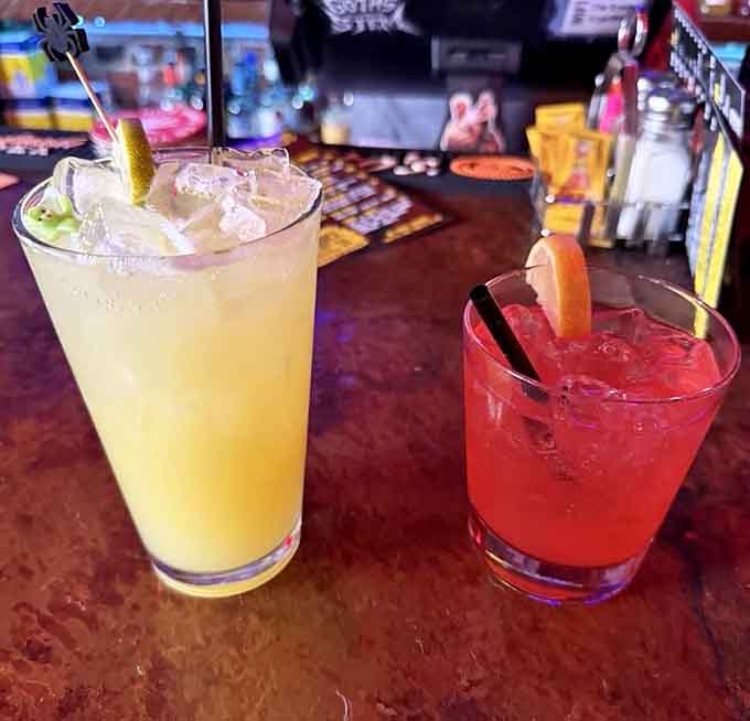 Bright cocktails glow under moody lighting, each sip bringing tropical vibes to this decidedly un-tropical horror haven.