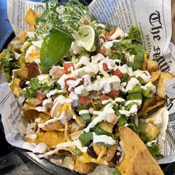 Seafood nachos loaded with toppings prove fusion cuisine belongs everywhere, even at traditional Chesapeake Bay waterfront restaurants serving fresh catches.