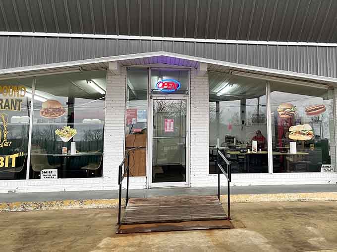The welcoming entrance with its vintage Dairy Queen sign hints at the nostalgic experience waiting inside for hungry travelers.