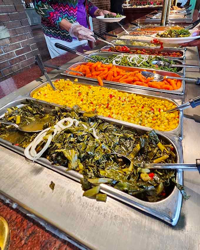 Collard greens, golden corn, and bright carrots create a colorful parade of sides that actually taste like vegetables should.