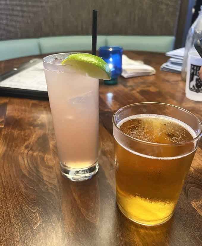 A Paloma and a cold draft beer sitting together like old friends, ready for whatever happens next.