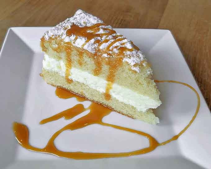 Lemon cream cake drizzled with caramel sauce, because sometimes dessert is the whole reason we pretend to save room.
