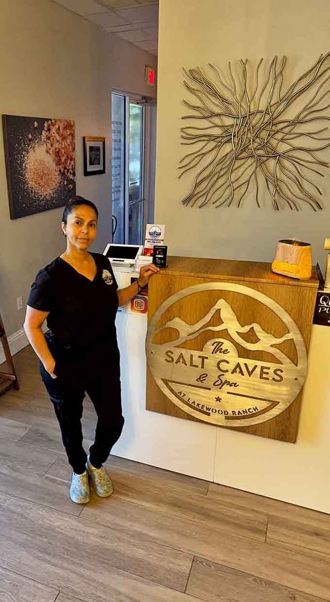 The welcoming reception area features their mountain logo, reminding you that wellness journeys don't require actual mountain climbing.