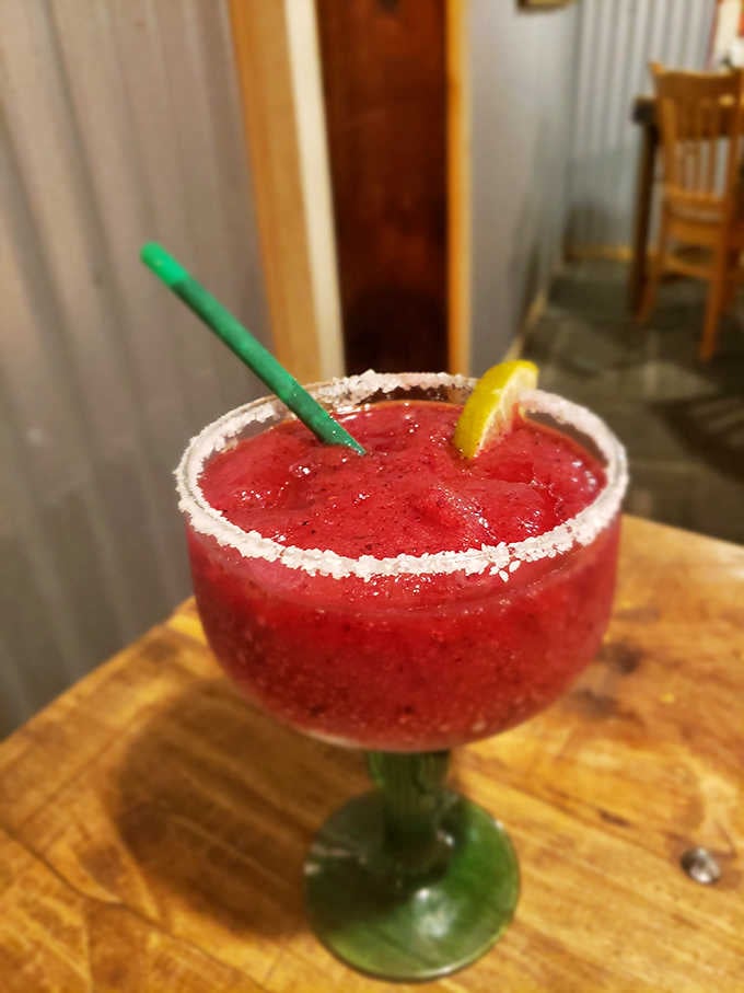 A frozen strawberry margarita with a salt rim that looks like summer vacation decided to visit Eastern Oregon.