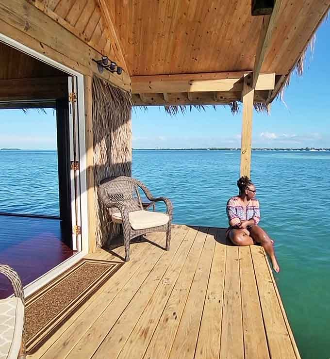 Dangling your feet over crystal-clear water while contemplating life's important questions, like why you waited so long.