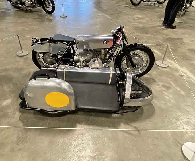 Racing sidecars required a special kind of bravery, leaning into corners inches from the pavement at terrifying speeds.